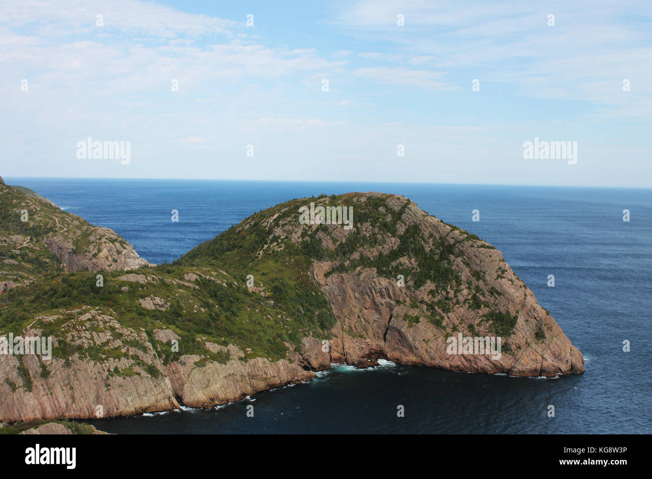 Steep, rocky cliffs along the coastline, St. John's, Newfoundland ...