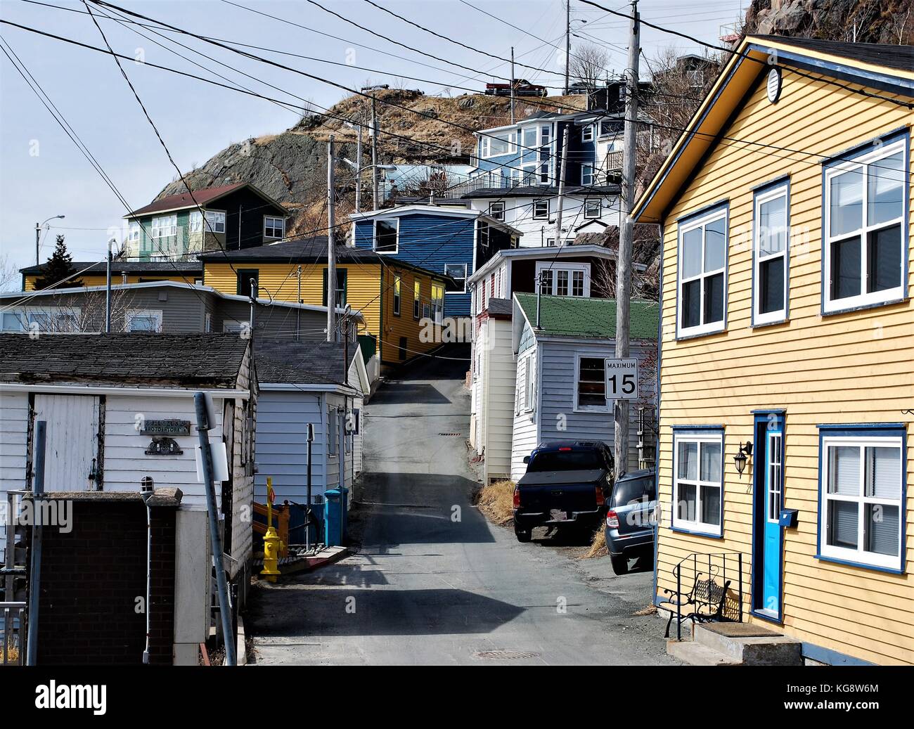 Houses and fishing shed lining the sides of Outer battery Road, Signal ...