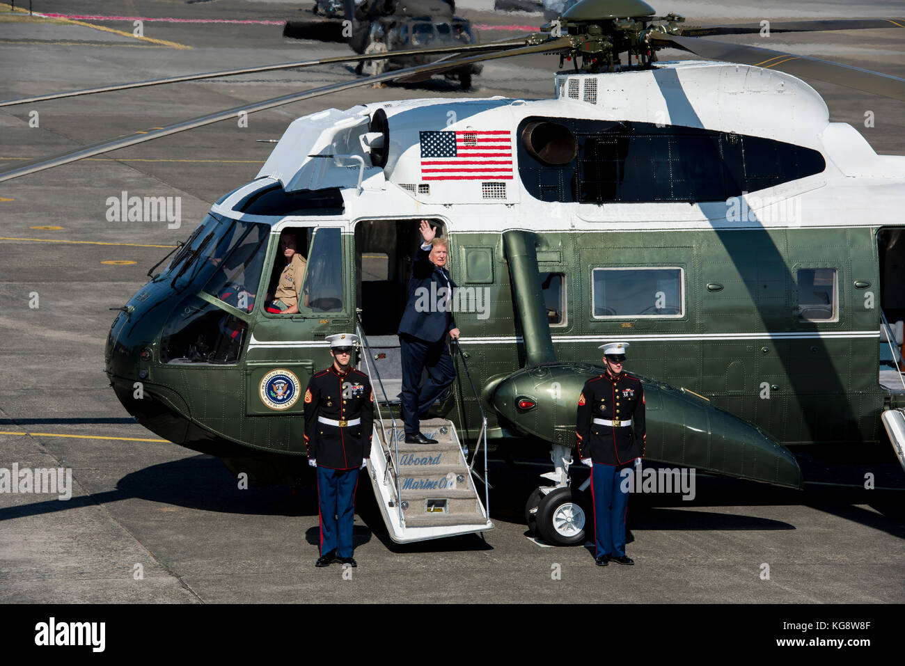 President Donald J. Trump waves good-buy as he boards Marine One after ...