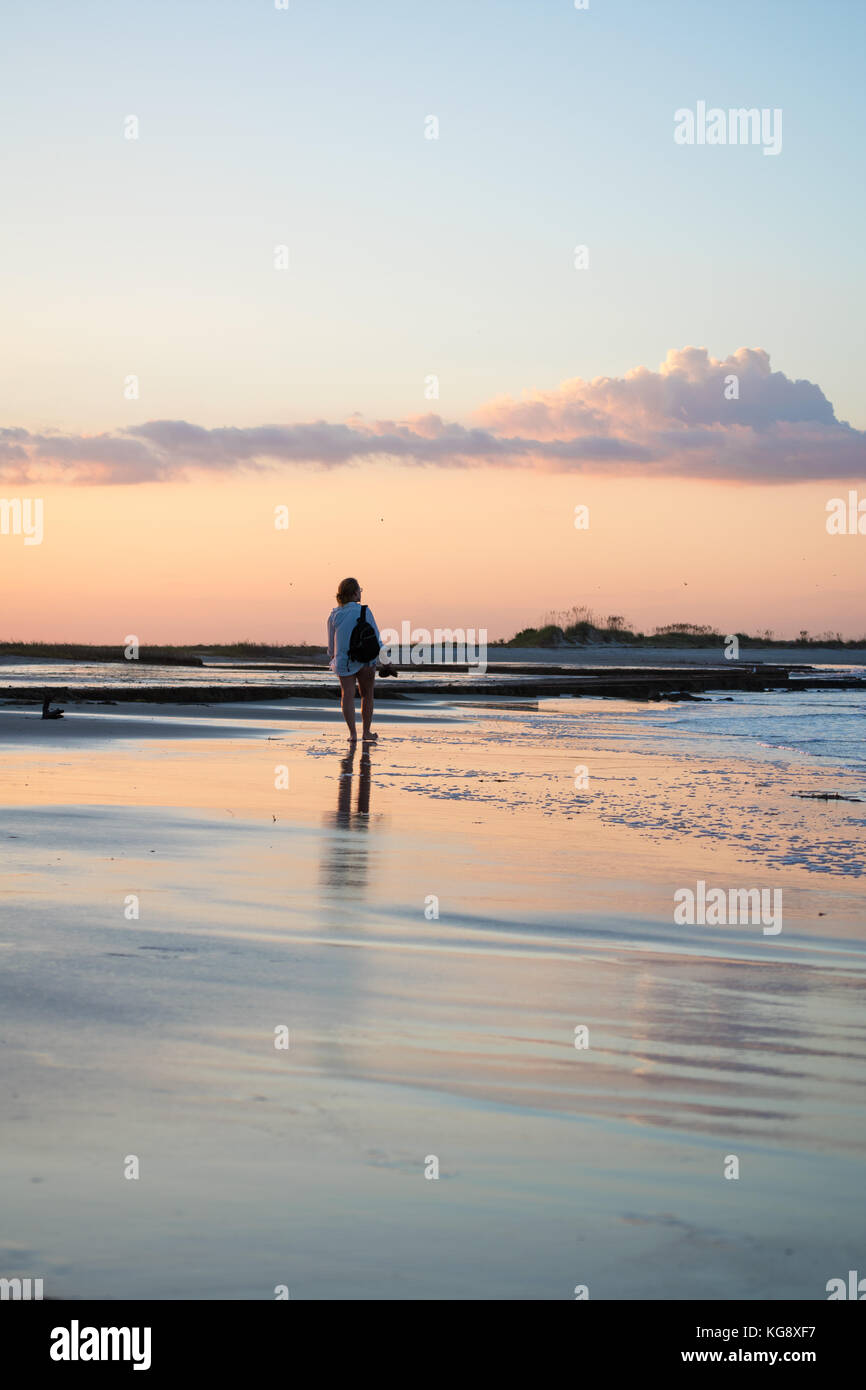 Walking at sunset Stock Photo - Alamy