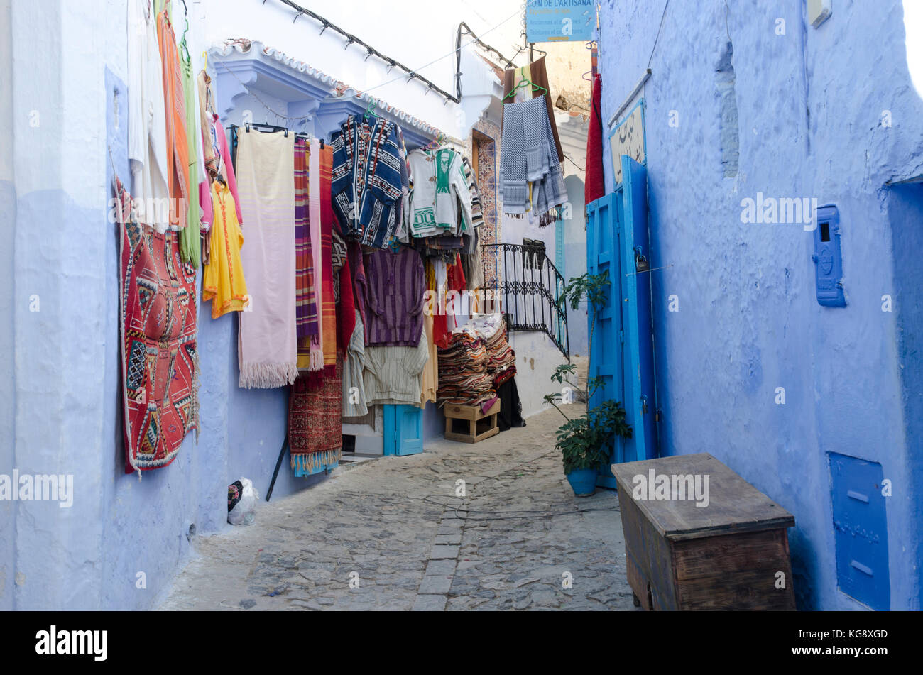 Displayed carpets and rugs in Chefchaouen's medina, Morocco Stock Photo ...
