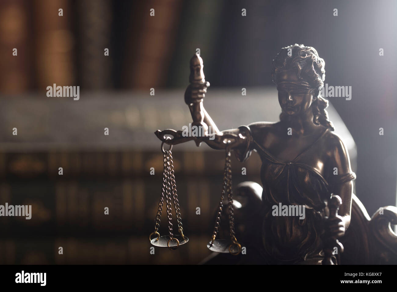 Law theme. Judge concept. Statue of justice, scale, gavel and books in ...