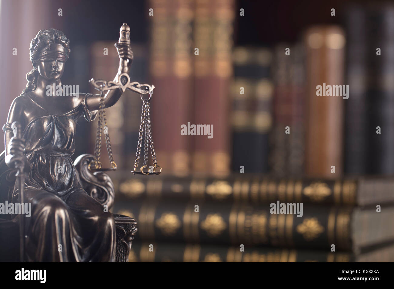 Law theme. Judge concept. Statue of justice, scale, gavel and books in ...