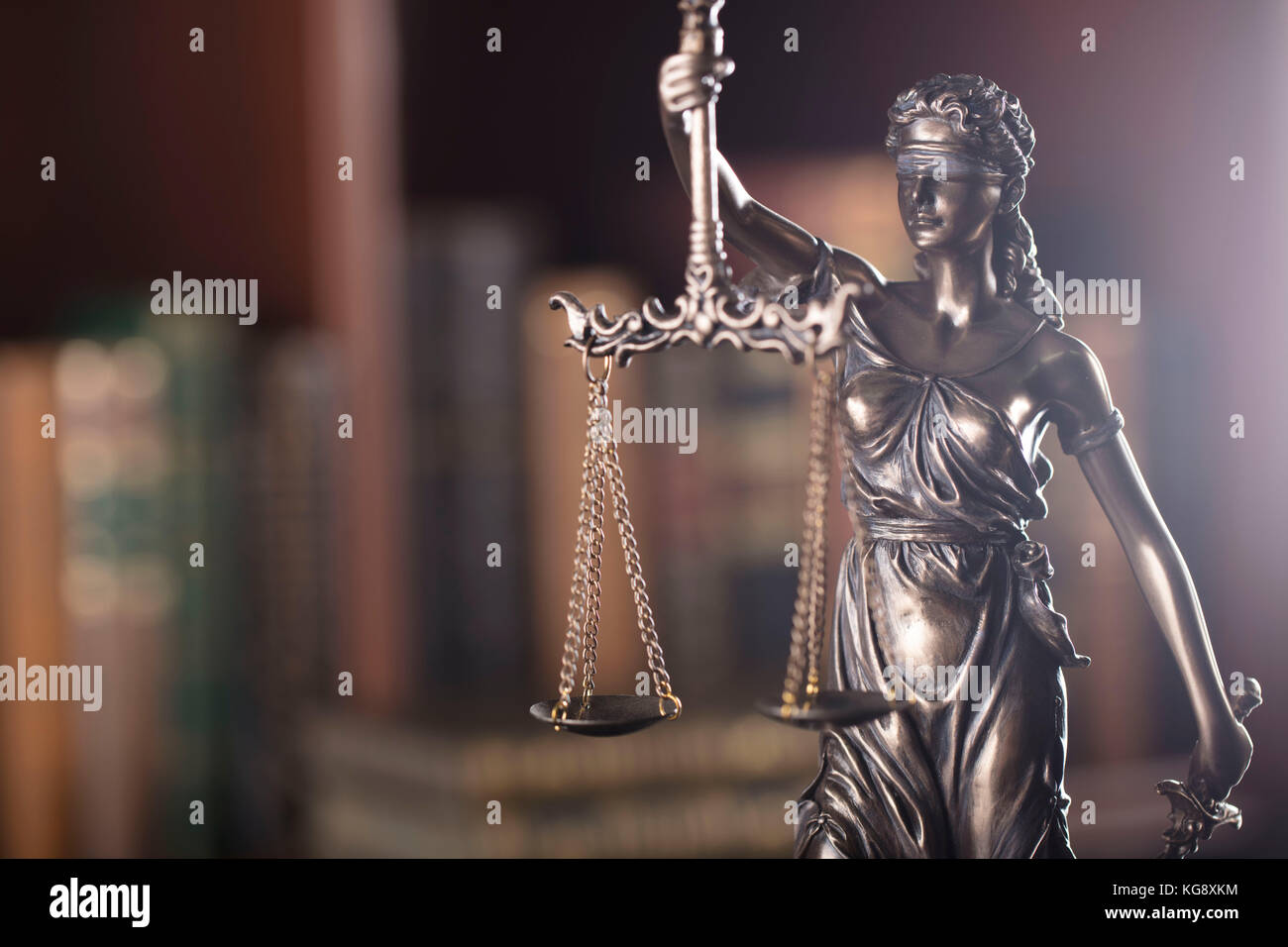 Law theme. Judge concept. Statue of justice, scale, gavel and books in ...