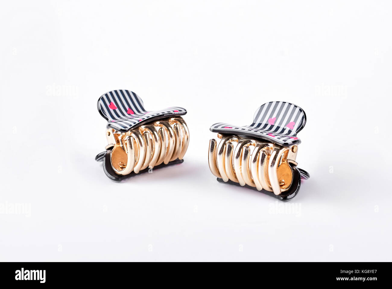 Beautiful hair clips on white background Stock Photo - Alamy
