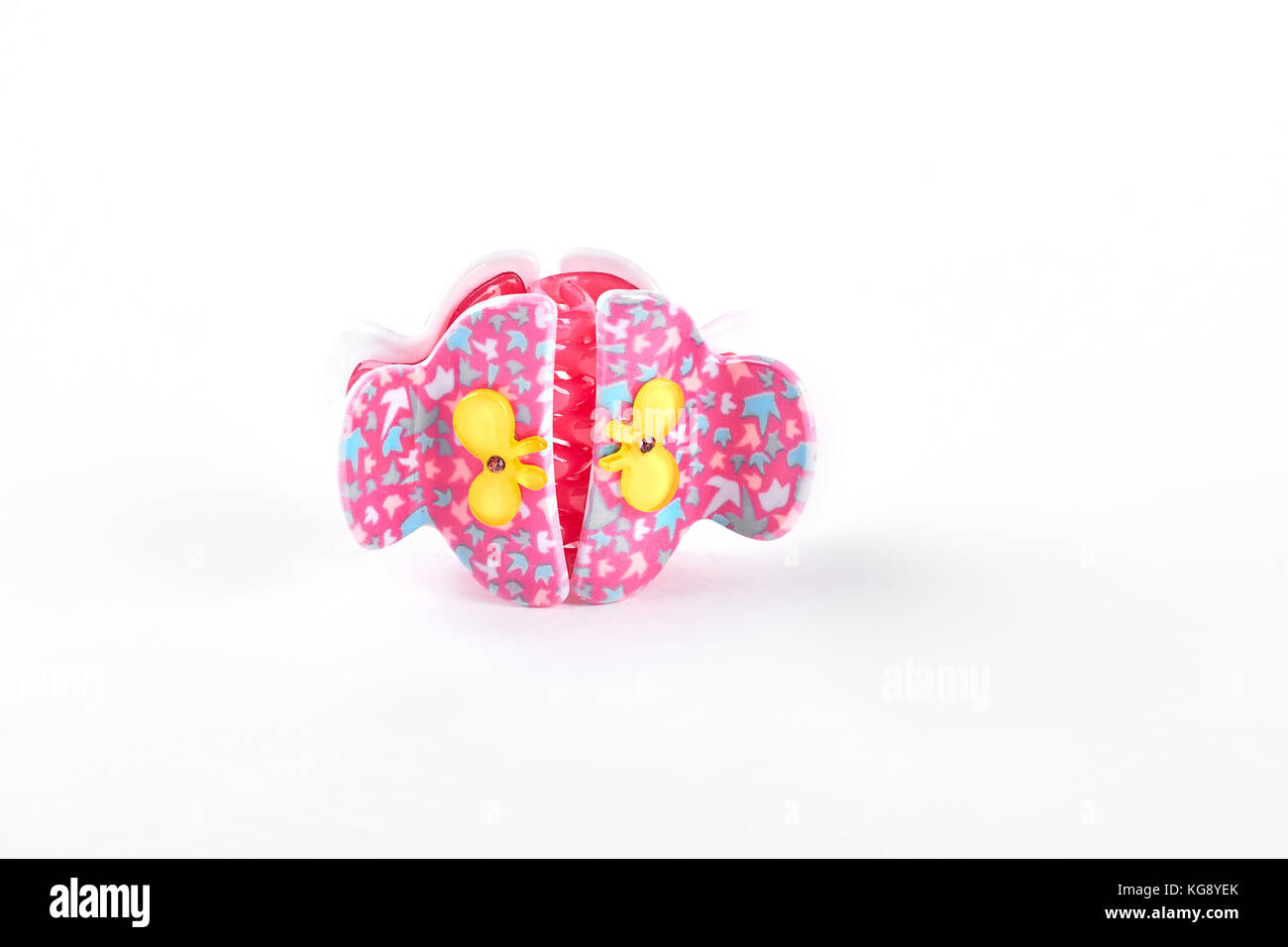 Cute kids hair pins on white background Stock Photo - Alamy