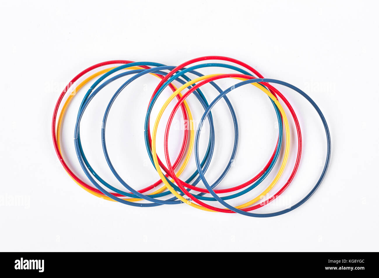 Colored plastic bracelets on white background Stock Photo - Alamy