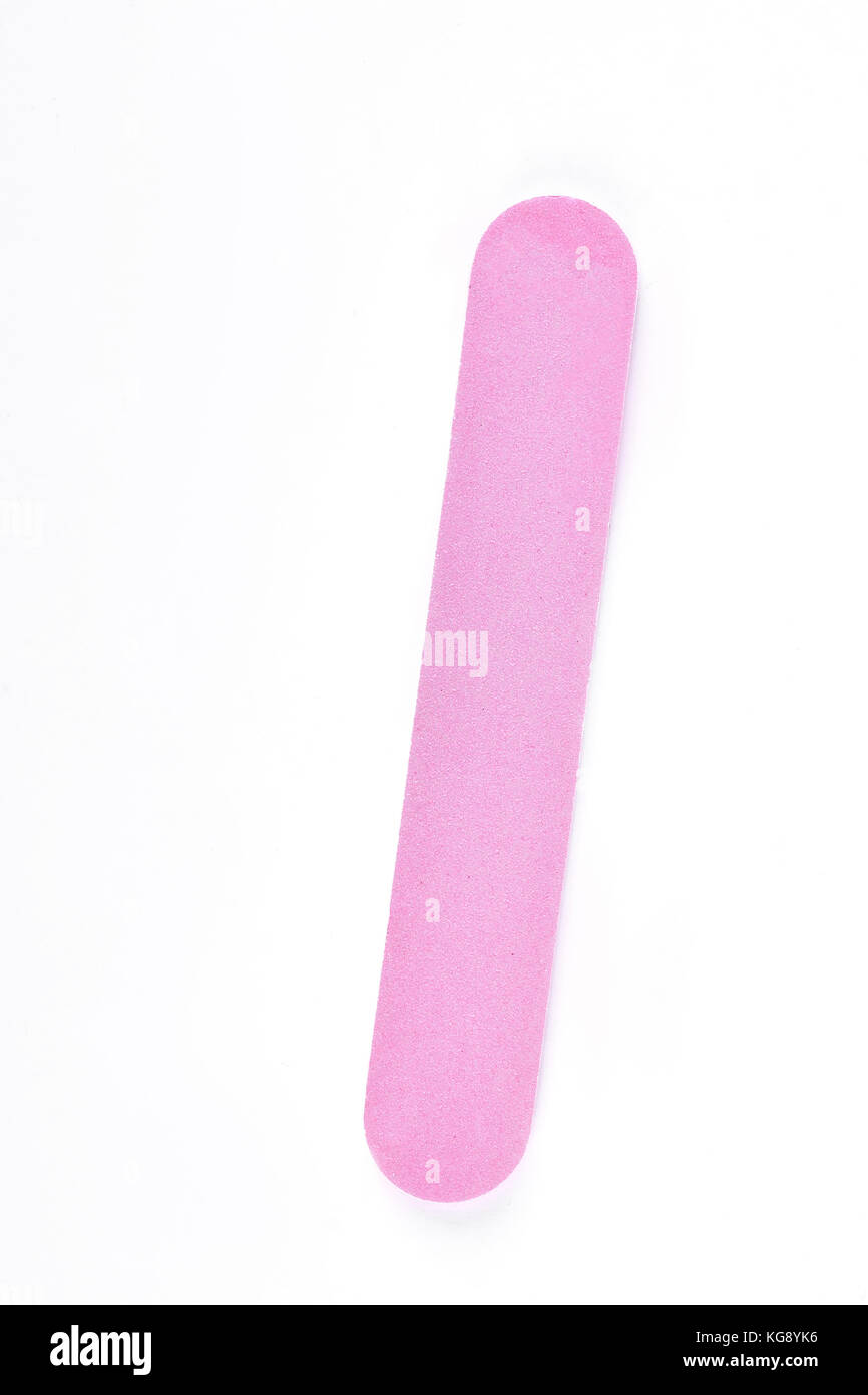 Pink nail file on a white background Stock Photo - Alamy