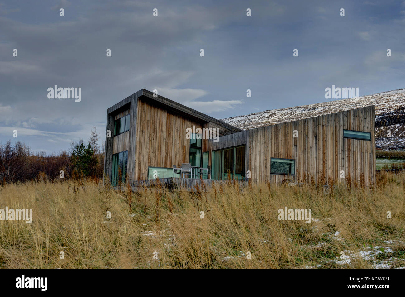 Icelandic House near Akureyri in with yellow grass and cloudy sk Stock ...