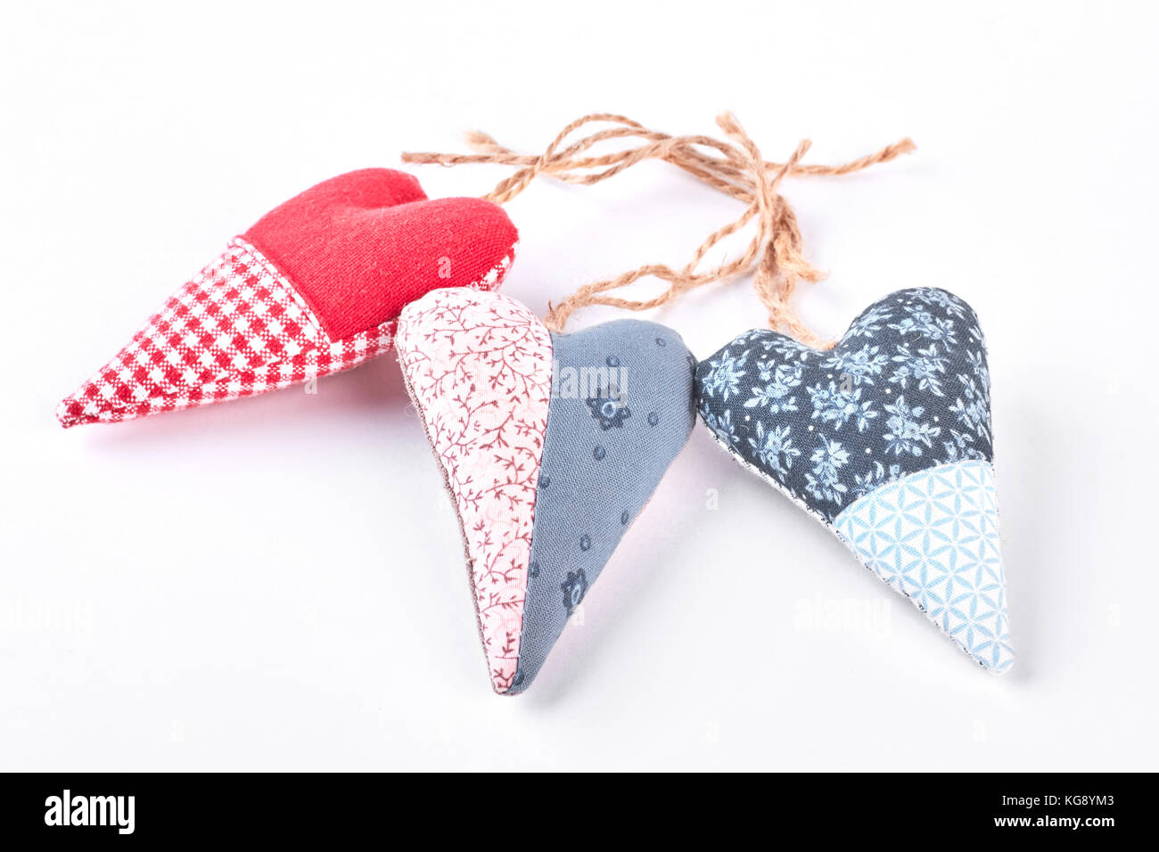 Three handmade hearts on white background Stock Photo - Alamy