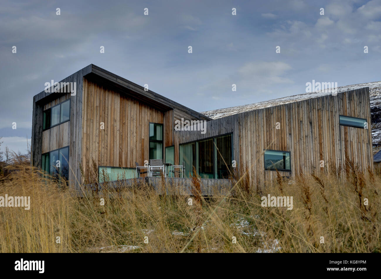 Icelandic House near Akureyri in with yellow grass and cloudy sk Stock ...