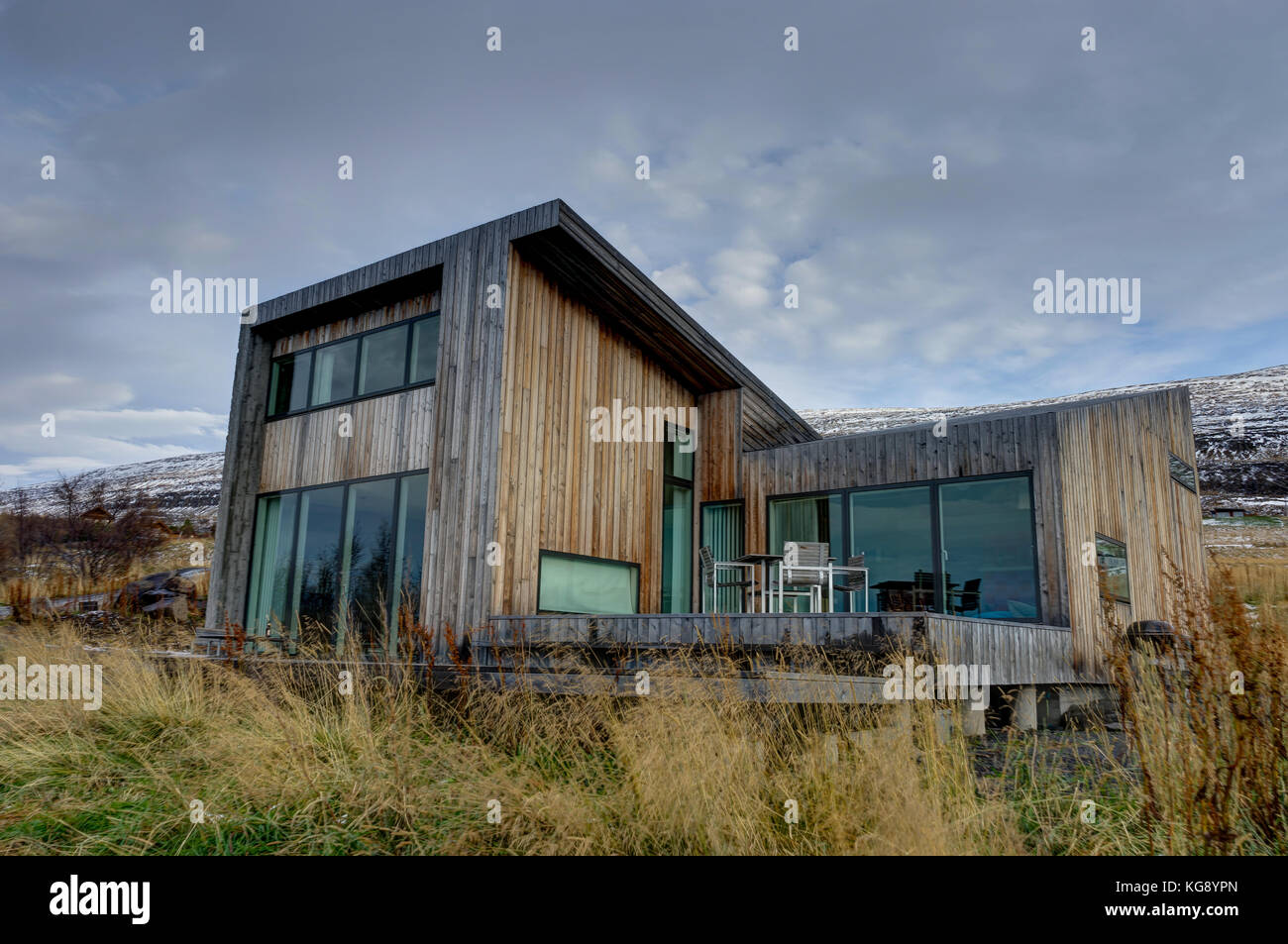 Icelandic House near Akureyri in with yellow grass and cloudy sk Stock ...