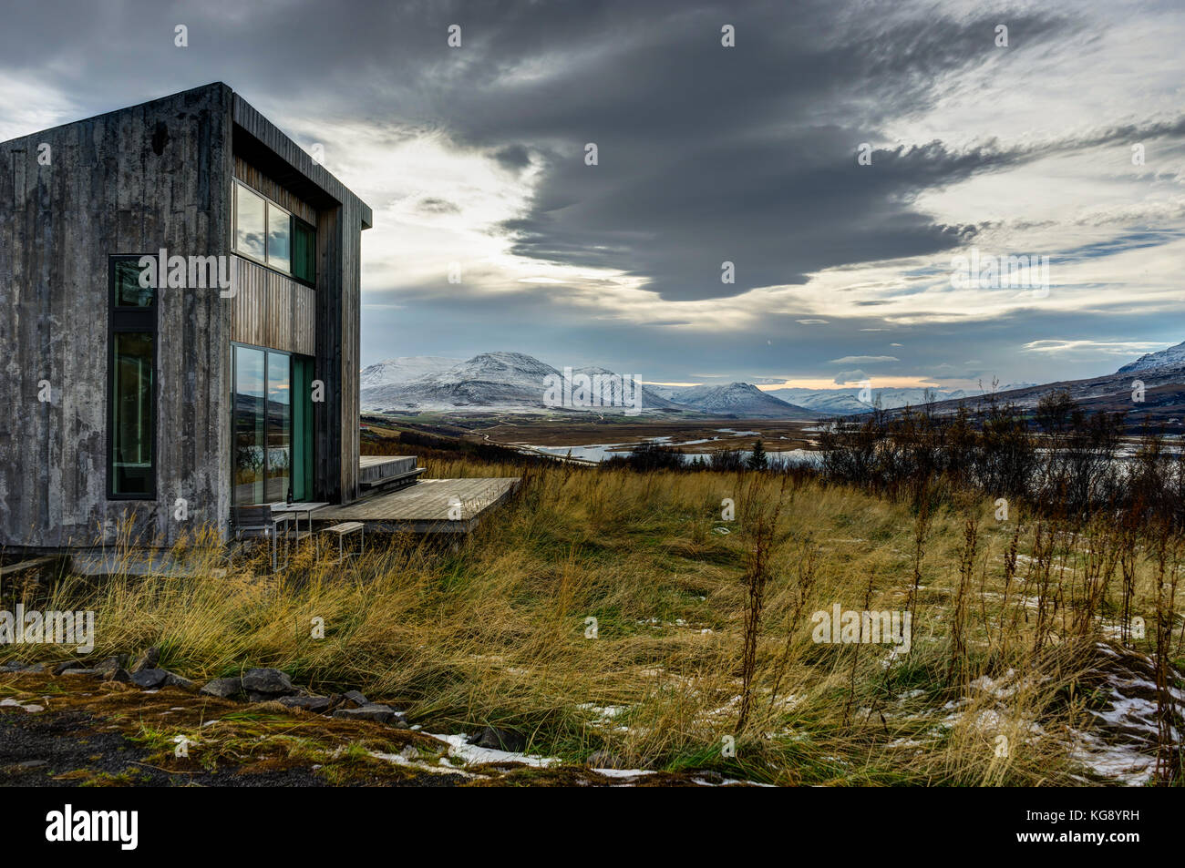 Icelandic House near Akureyri in with yellow grass and cloudy sk Stock ...