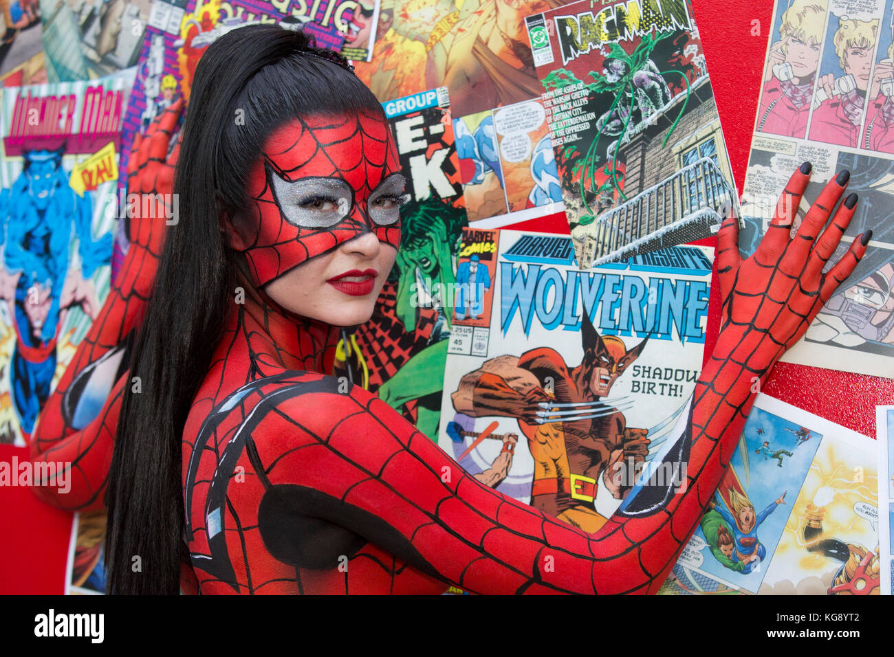 Young woman with a Spider-Woman bodypaint at a make-up graduation show ...