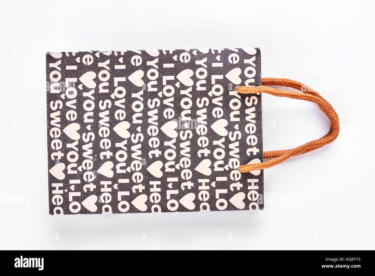 Black paper patterned gift packet Stock Photo - Alamy