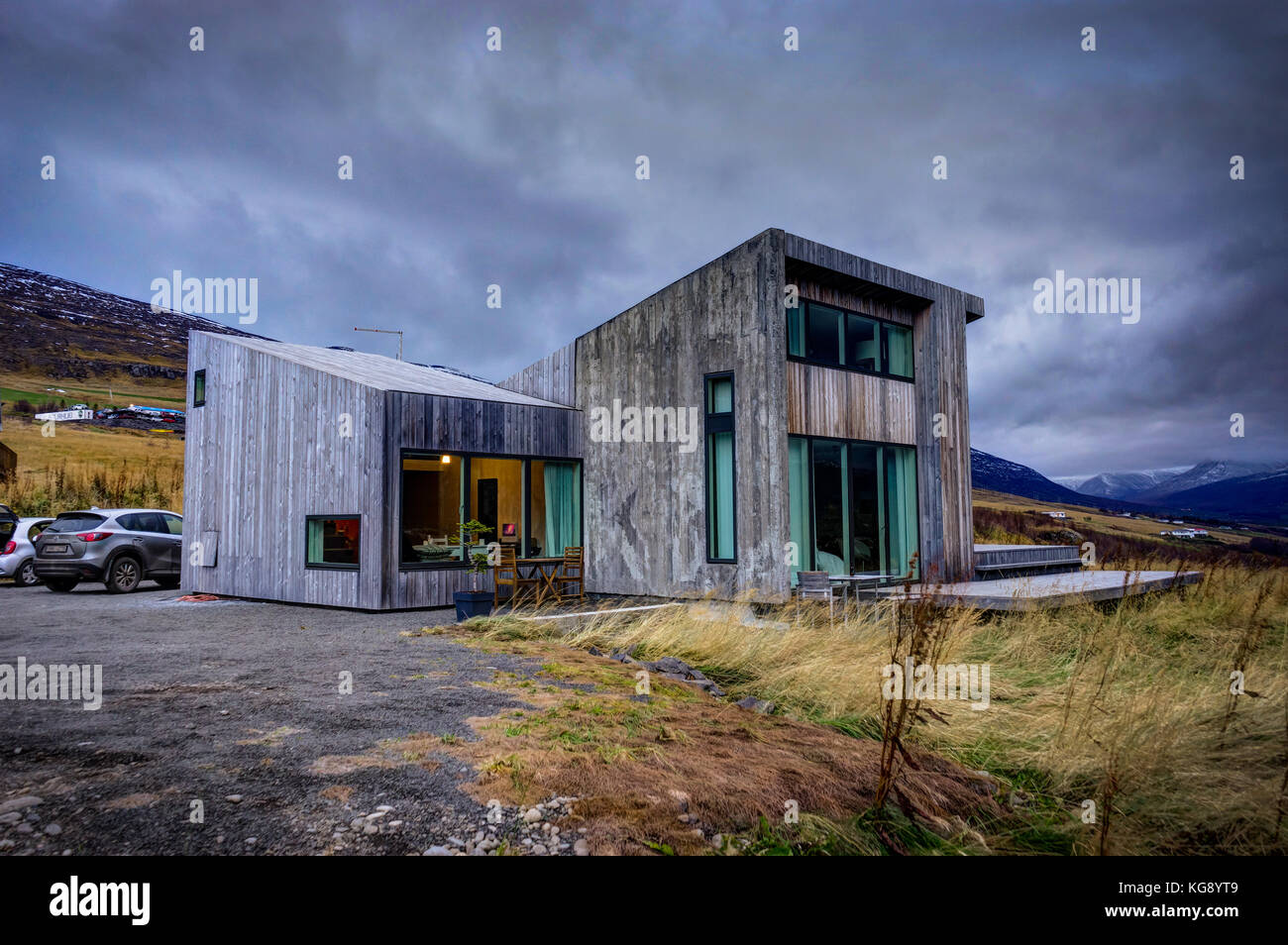 Icelandic House near Akureyri in with yellow grass and cloudy sk Stock ...