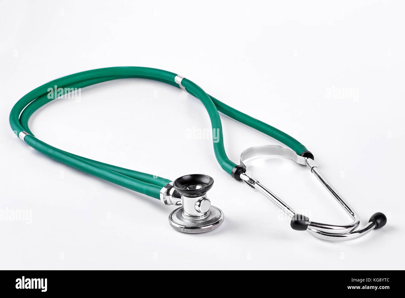 Green stethoscope on white background Stock Photo - Alamy