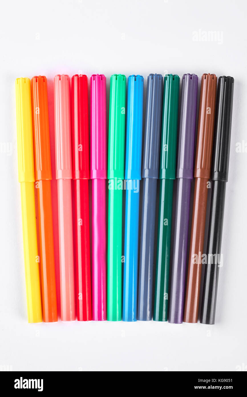 Colorful markers on white background Stock Photo - Alamy