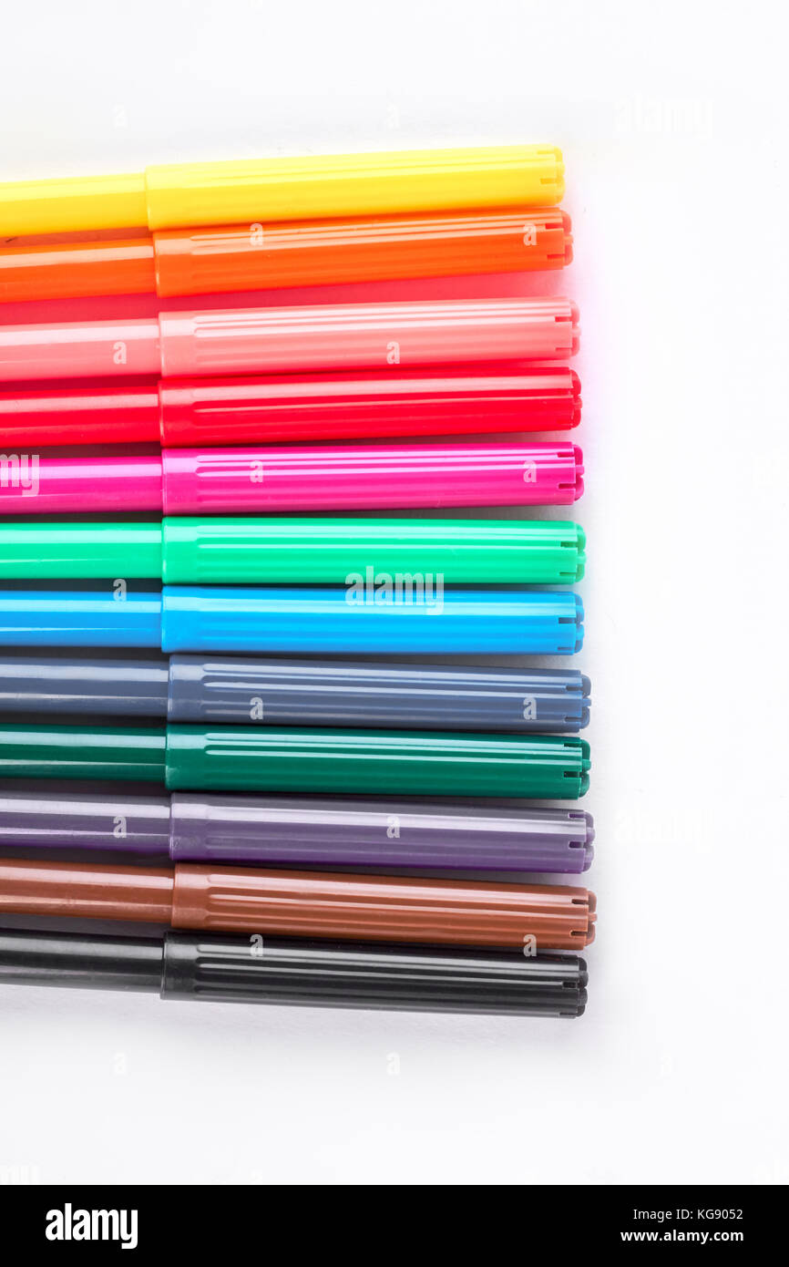 Set of multicolored markers, white background Stock Photo - Alamy