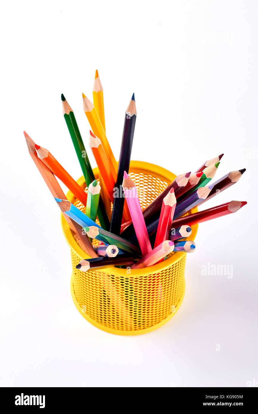 Multicolored pencils in metal pot Stock Photo - Alamy