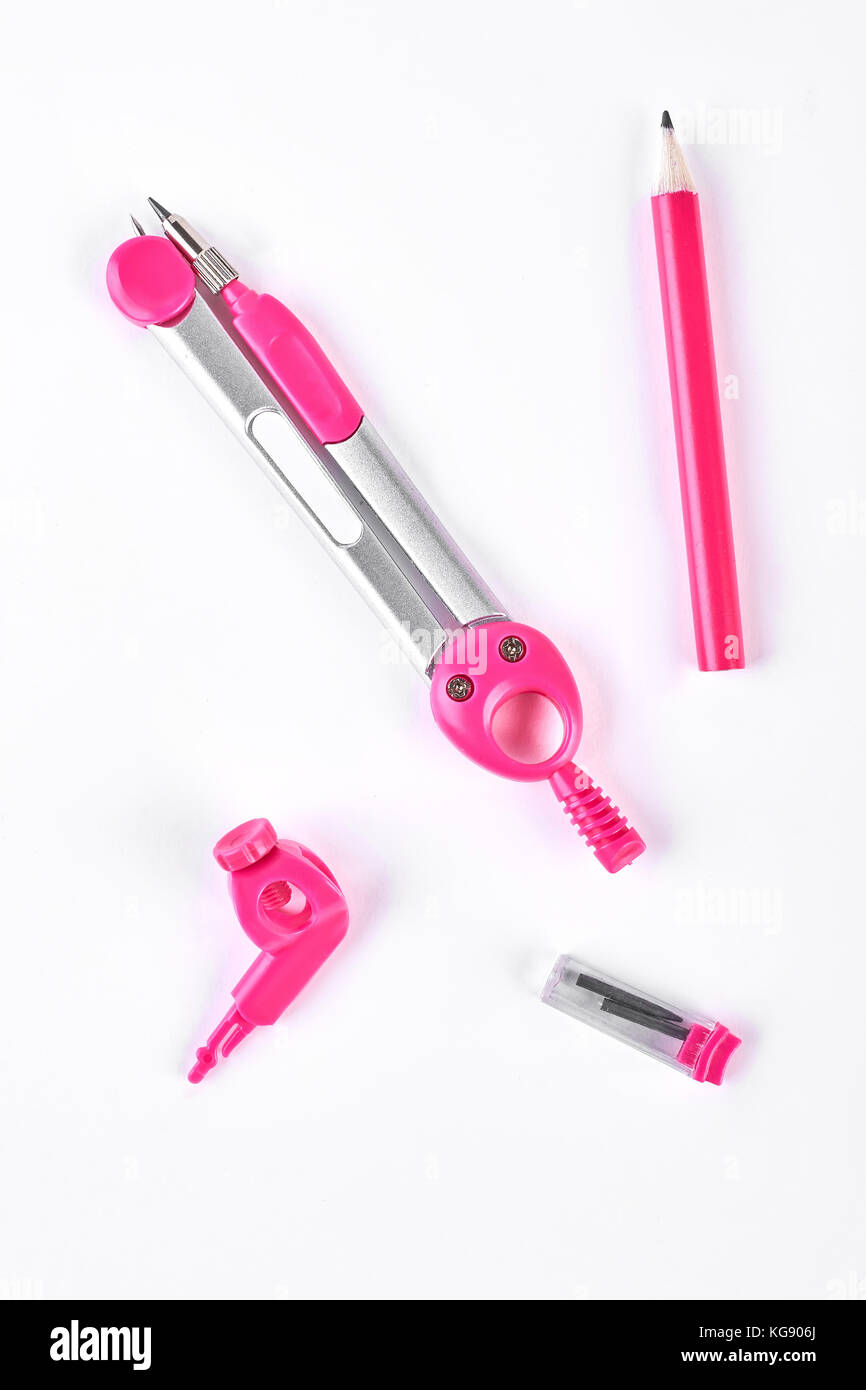 Pink drawing compasses and pencil Stock Photo - Alamy