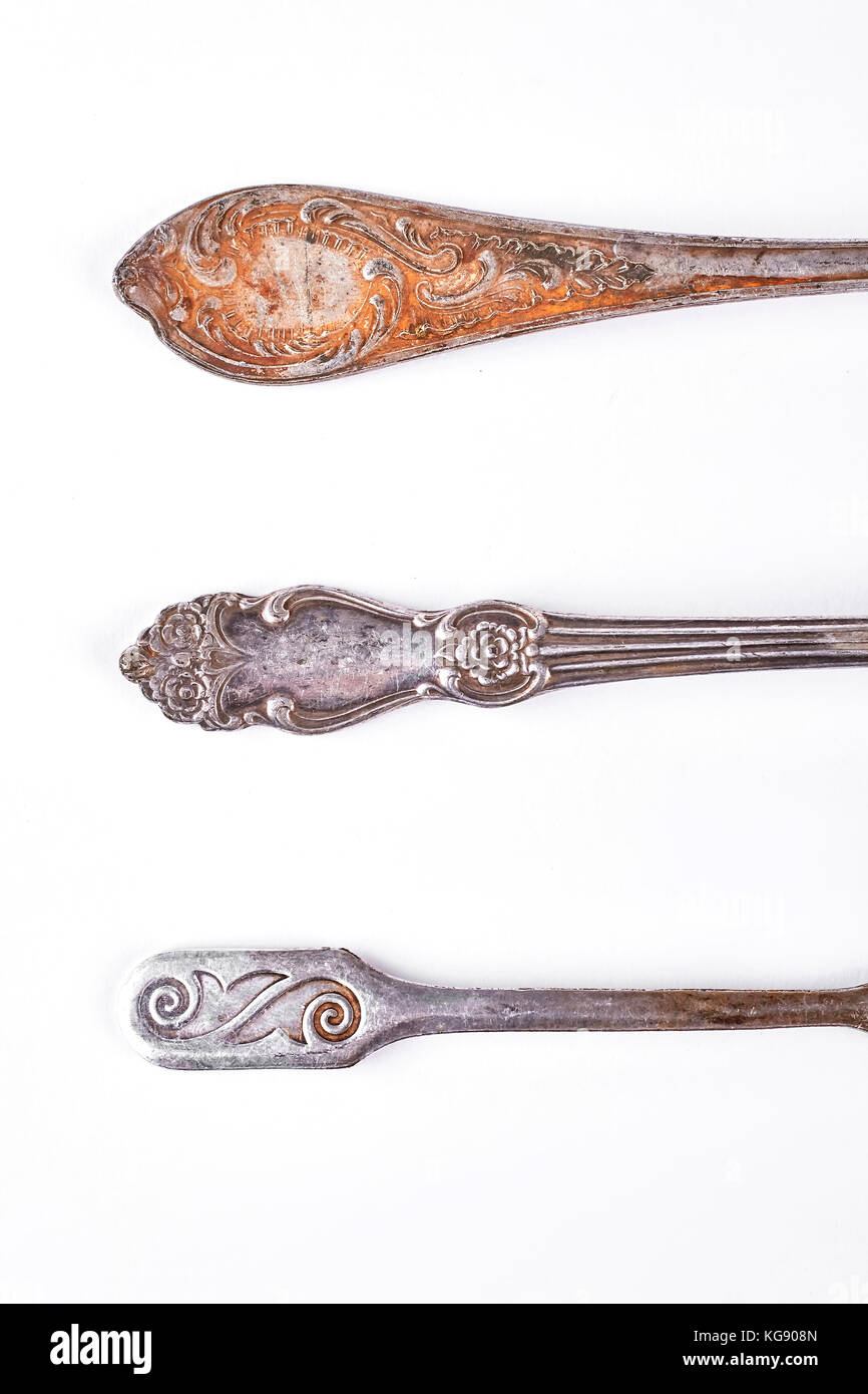 Rusty spoons and forks, top view Stock Photo - Alamy