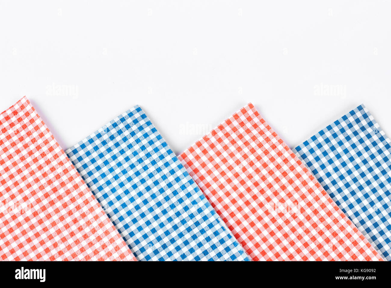 Plaid table napkins, white background Stock Photo - Alamy