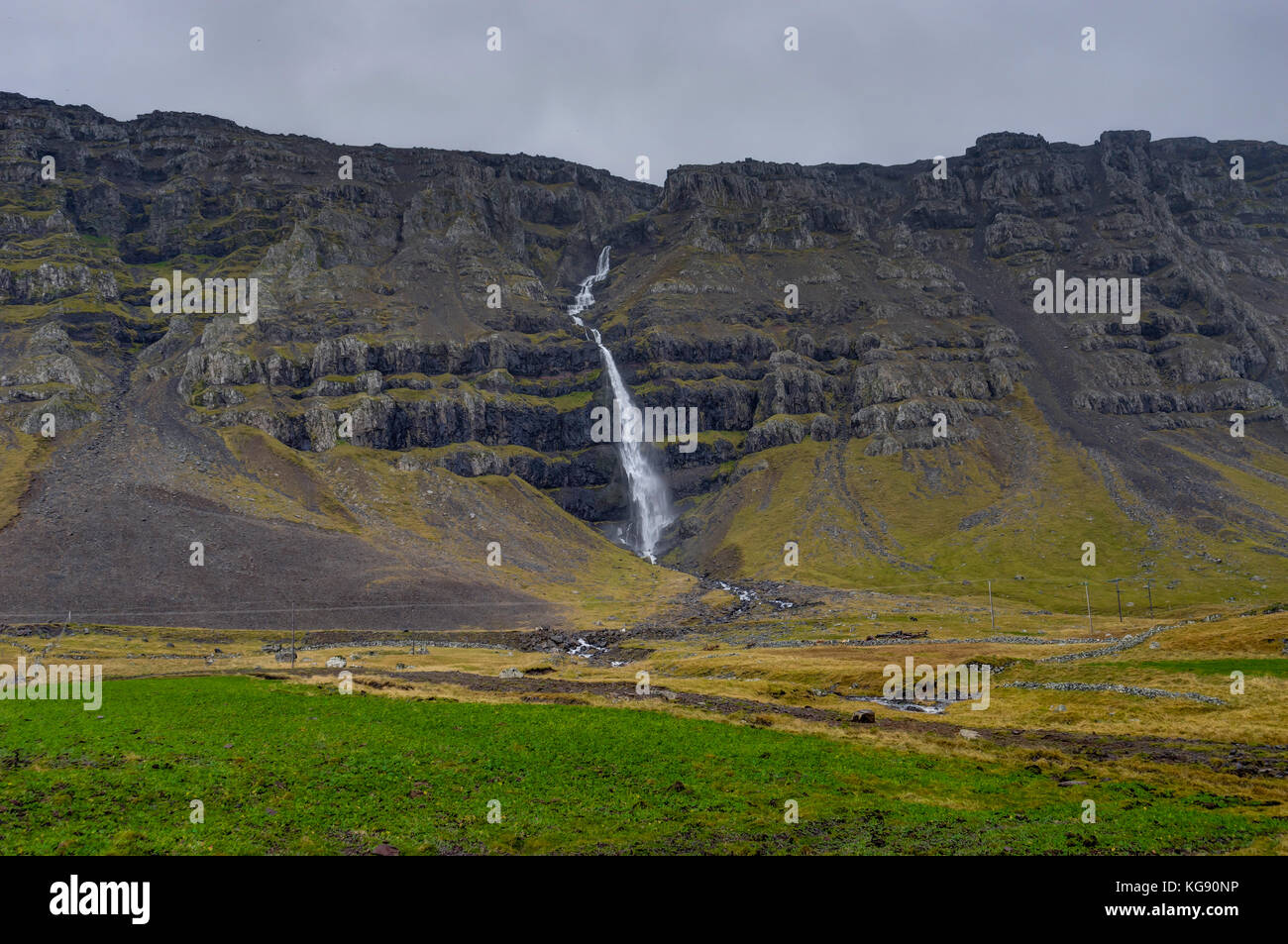 Hegifoss Waterfall in Iceland with mountains and cloudy sky mist Stock ...