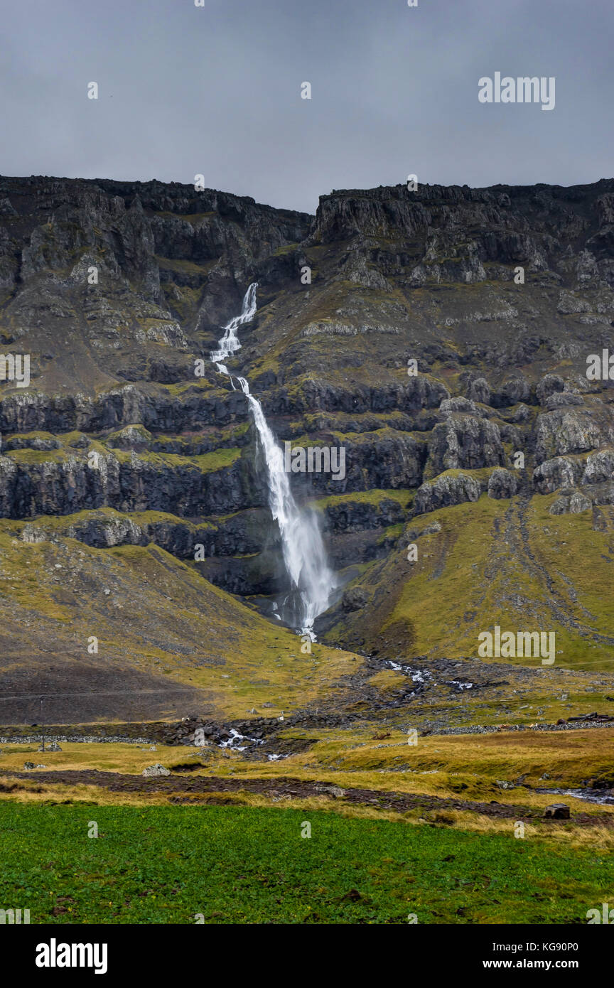 Hegifoss Waterfall in Iceland with mountains and cloudy sky mist Stock ...