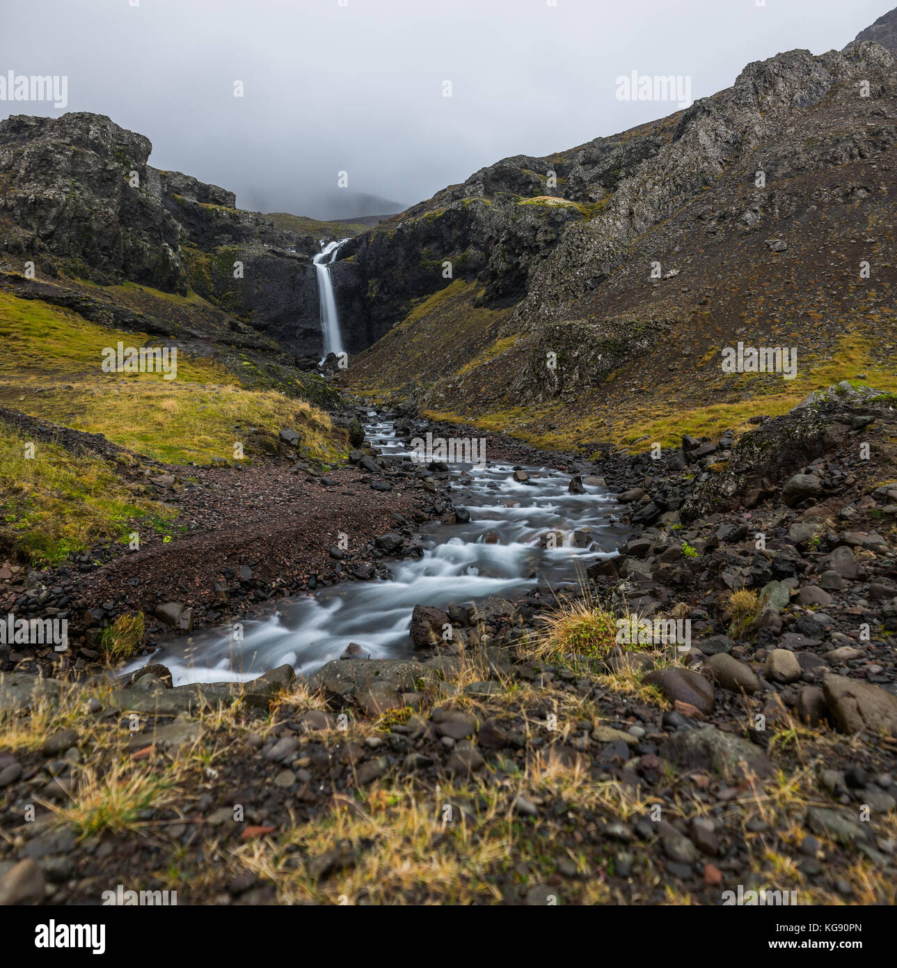 Hegifoss Waterfall in Iceland with mountains and river long expo Stock ...