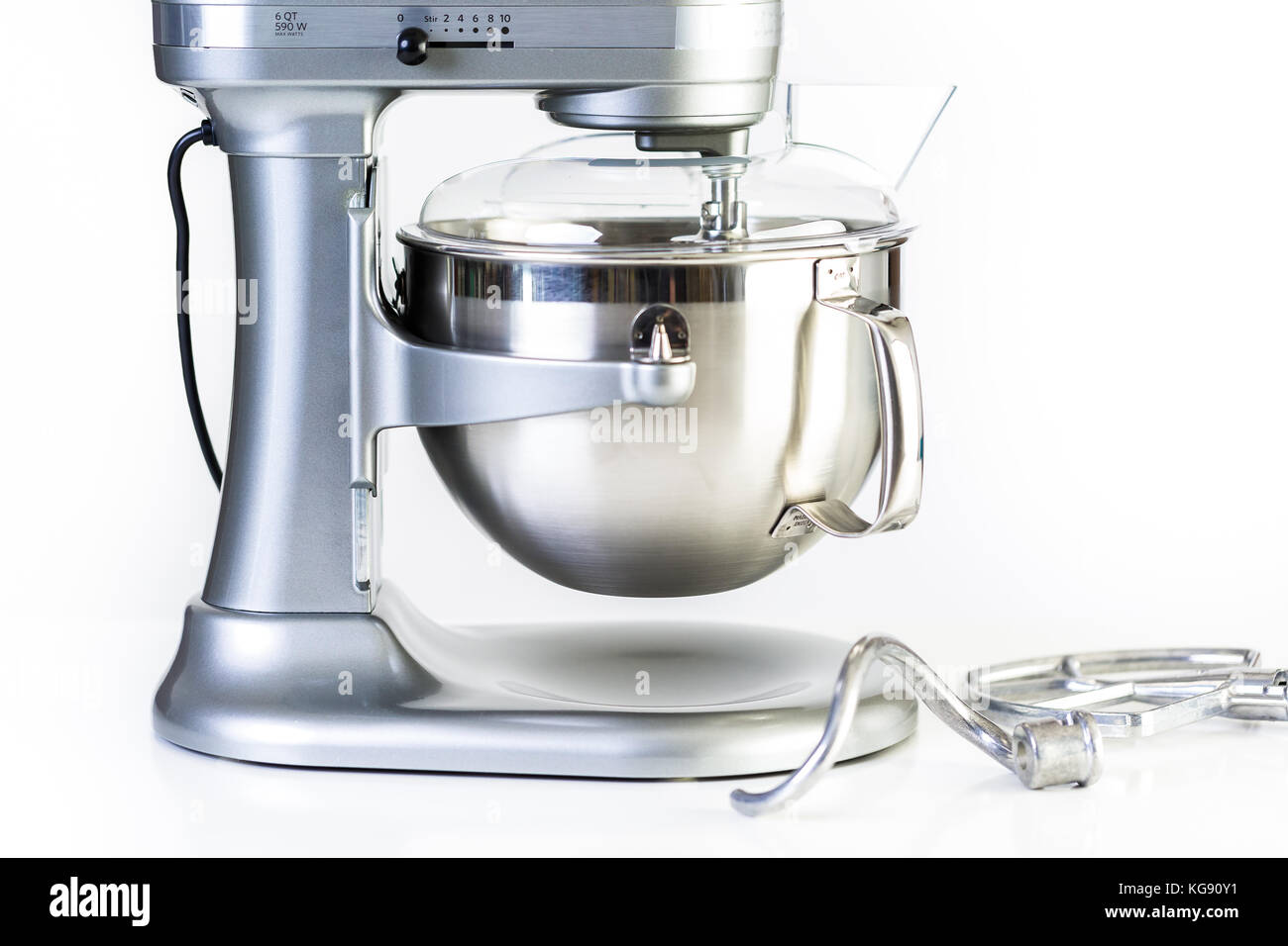 Silver food electric mixer on a white background Stock Photo - Alamy