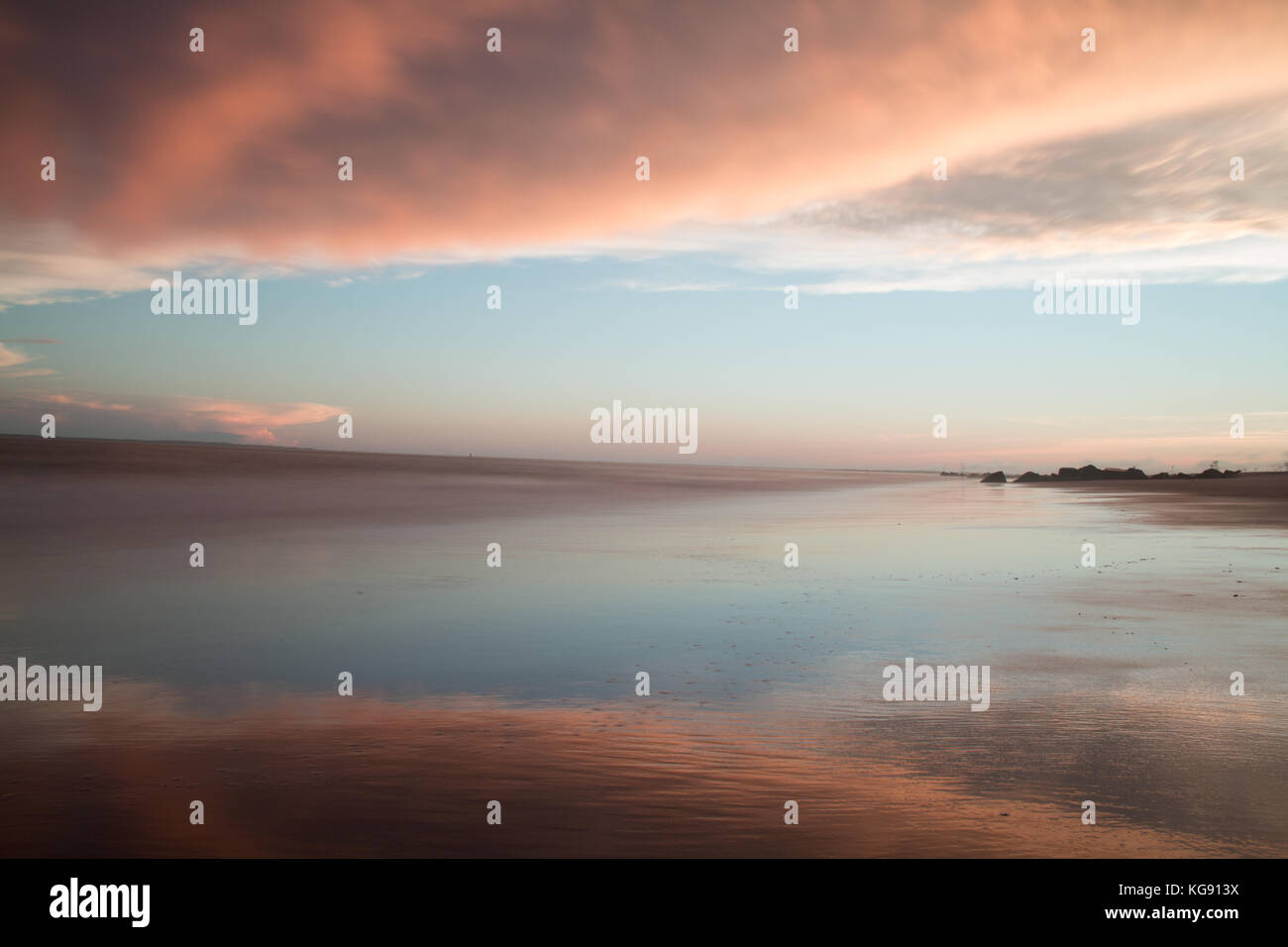 sky reflection on the beach Stock Photo - Alamy