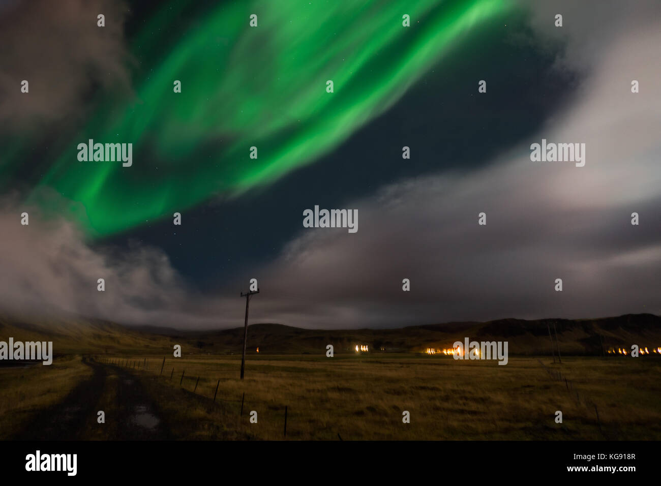 Northern lights Aurora Borealis above landscape in Iceland Stock Photo ...