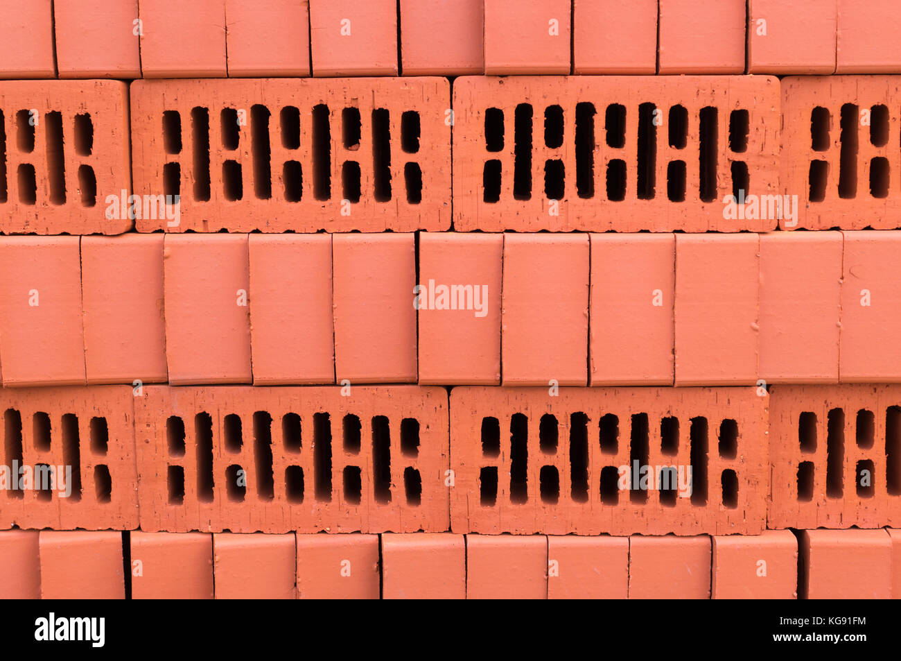 orange clay brick stack, pile. texture, background Stock Photo - Alamy
