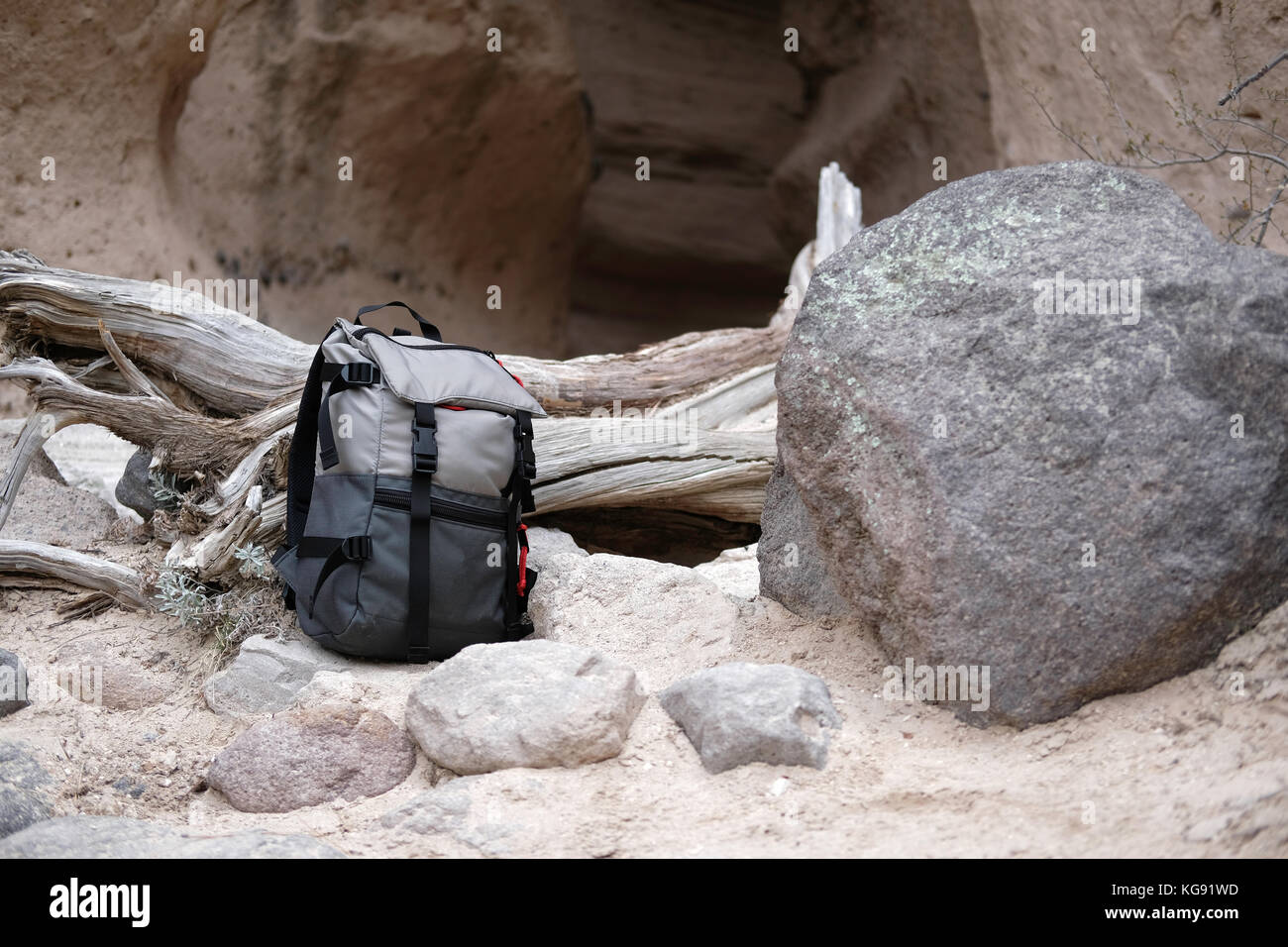 Backpack resting on the ground in a slot canyon in Tent Rocks National ...
