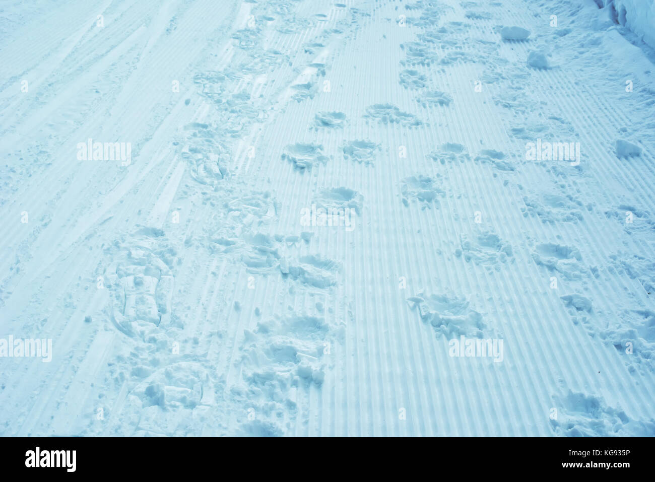 Footprints in the snow, abstract winter background Stock Photo - Alamy