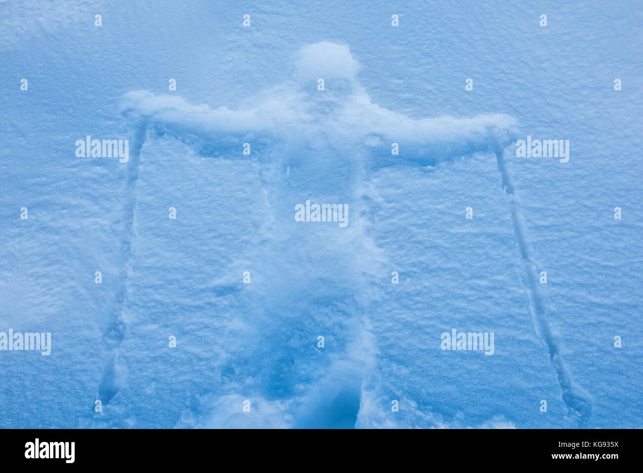 Skiing person imprint in winter snow on the ground Stock Photo - Alamy