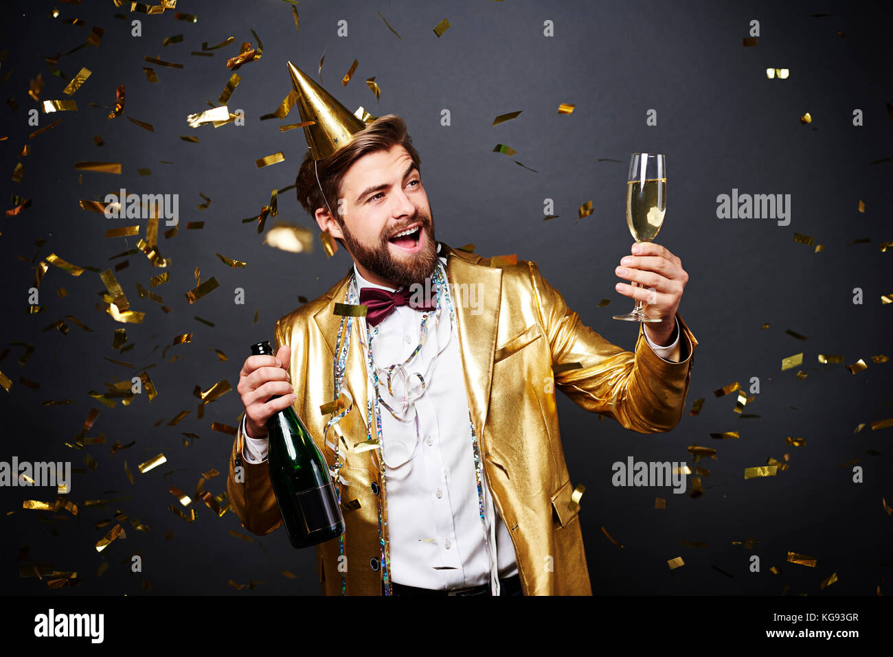 Man making a toast to new year Stock Photo - Alamy