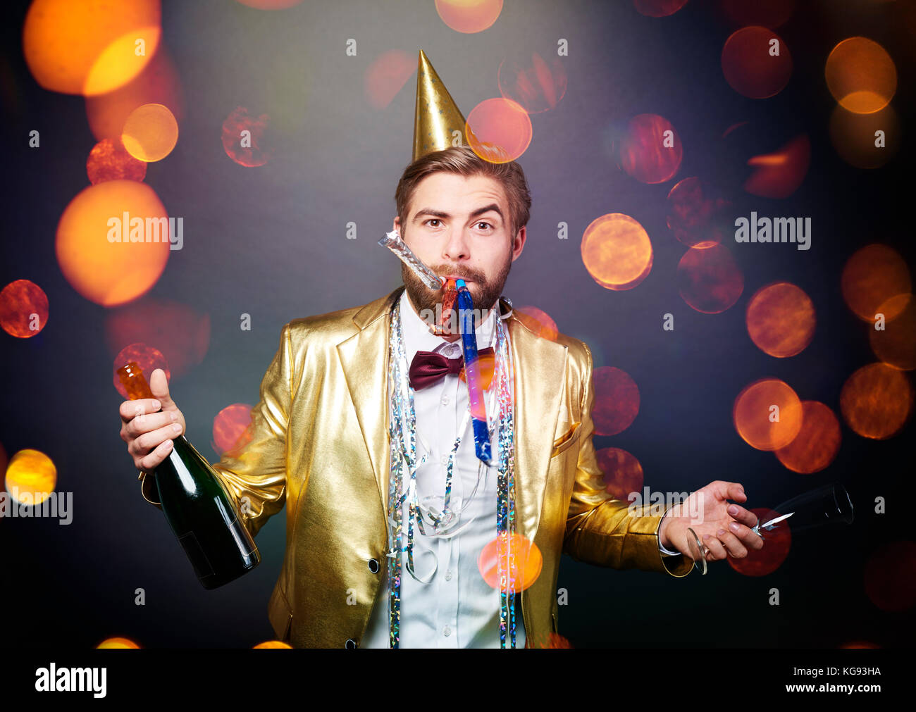 Man party horn blower confetti hi-res stock photography and images - Alamy