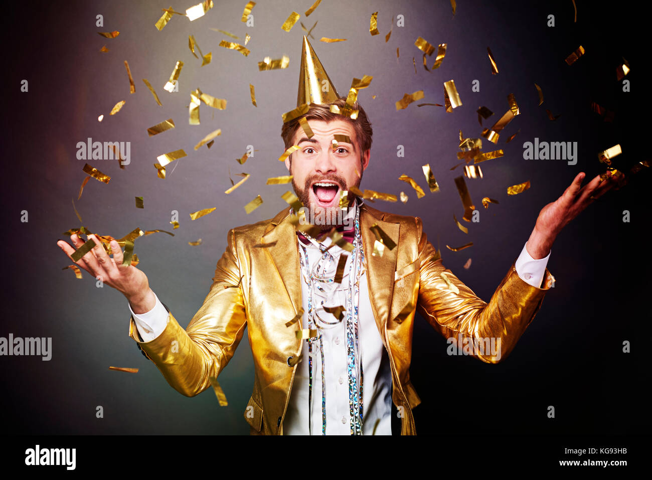 Portrait of man among confetti Stock Photo - Alamy