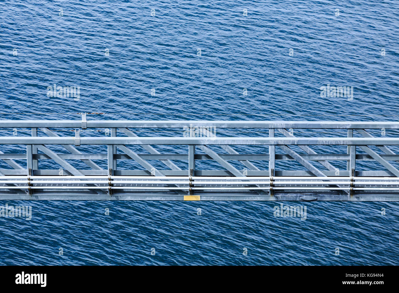 Steel Bridge Across Blue Water in Harbor Stock Photo - Alamy