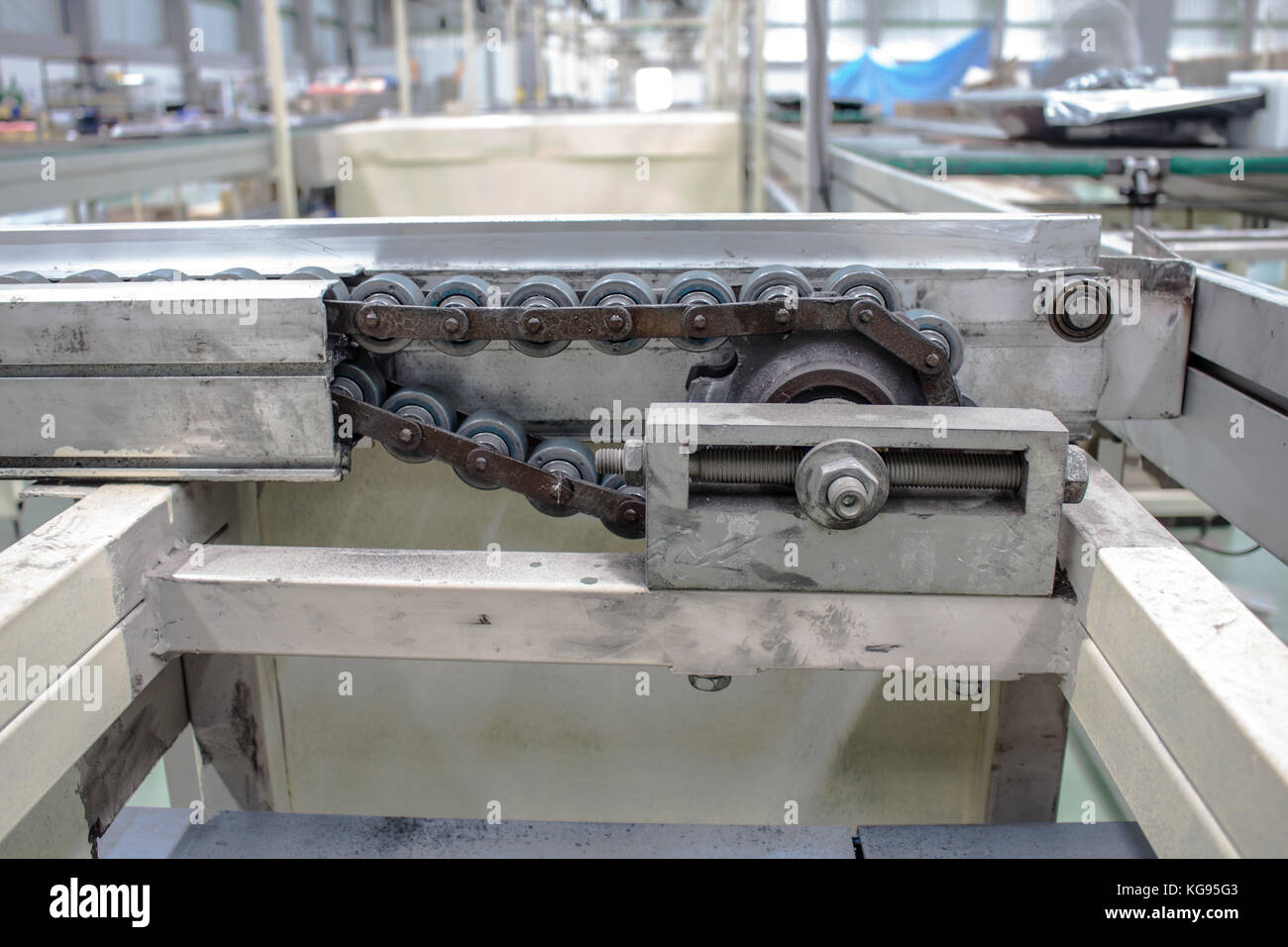The Equipment chain tensioning Line of Conveyor Stock Photo - Alamy