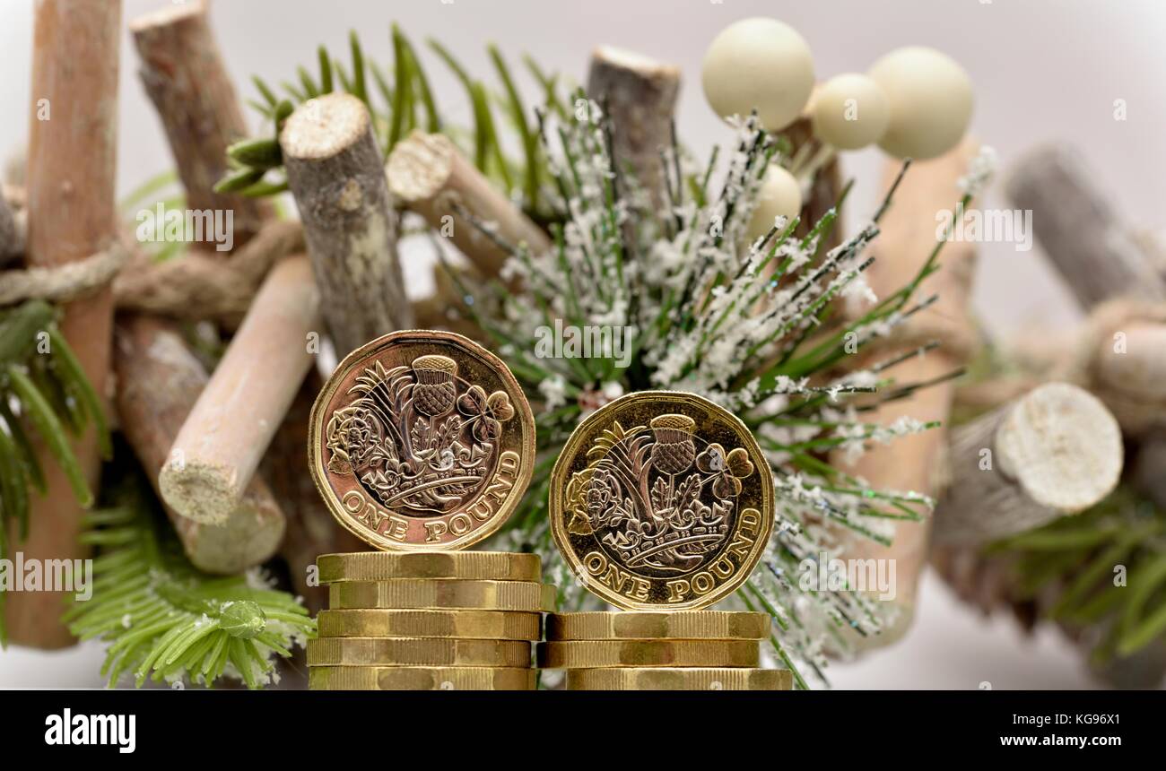 Christmas spending money one pound coins Stock Photo - Alamy