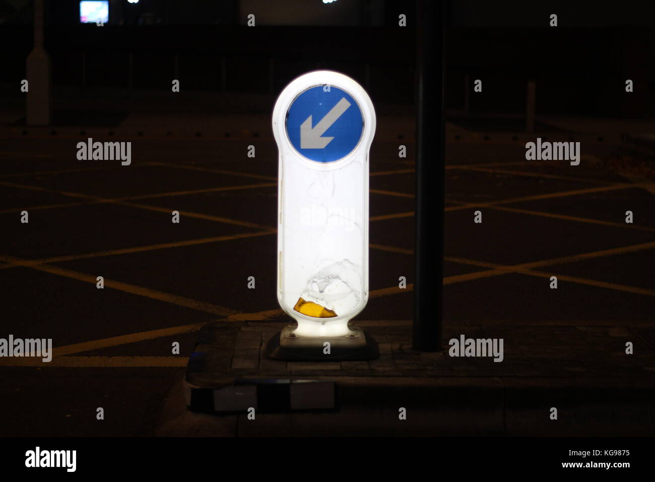 Road signs illuminated at night Stock Photo - Alamy