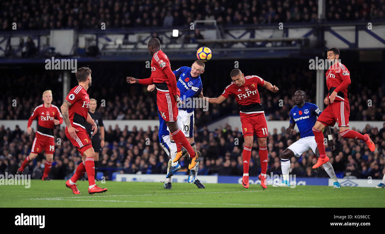 Everton's Wayne Rooney wins a header during the Premier League match at ...