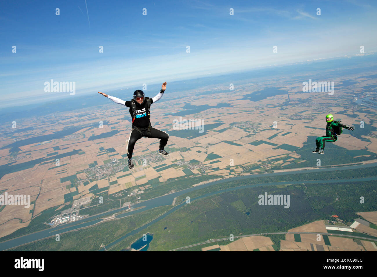 This freefly skydiving team is training the sit position together. It ...
