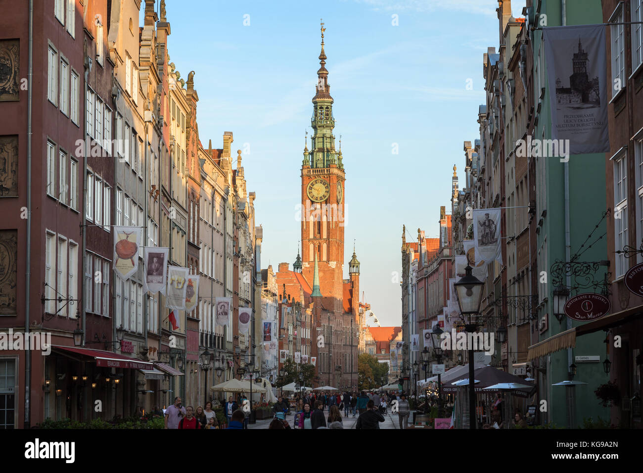 View of the Main Town Hall and tourists and local people strolling at ...