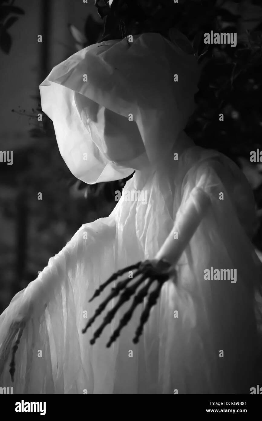 White ghost skeleton halloween back and white Stock Photo - Alamy