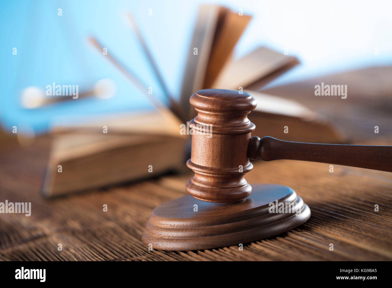 Judge concept. Mallet of the judge, justice scale and books on wooden ...