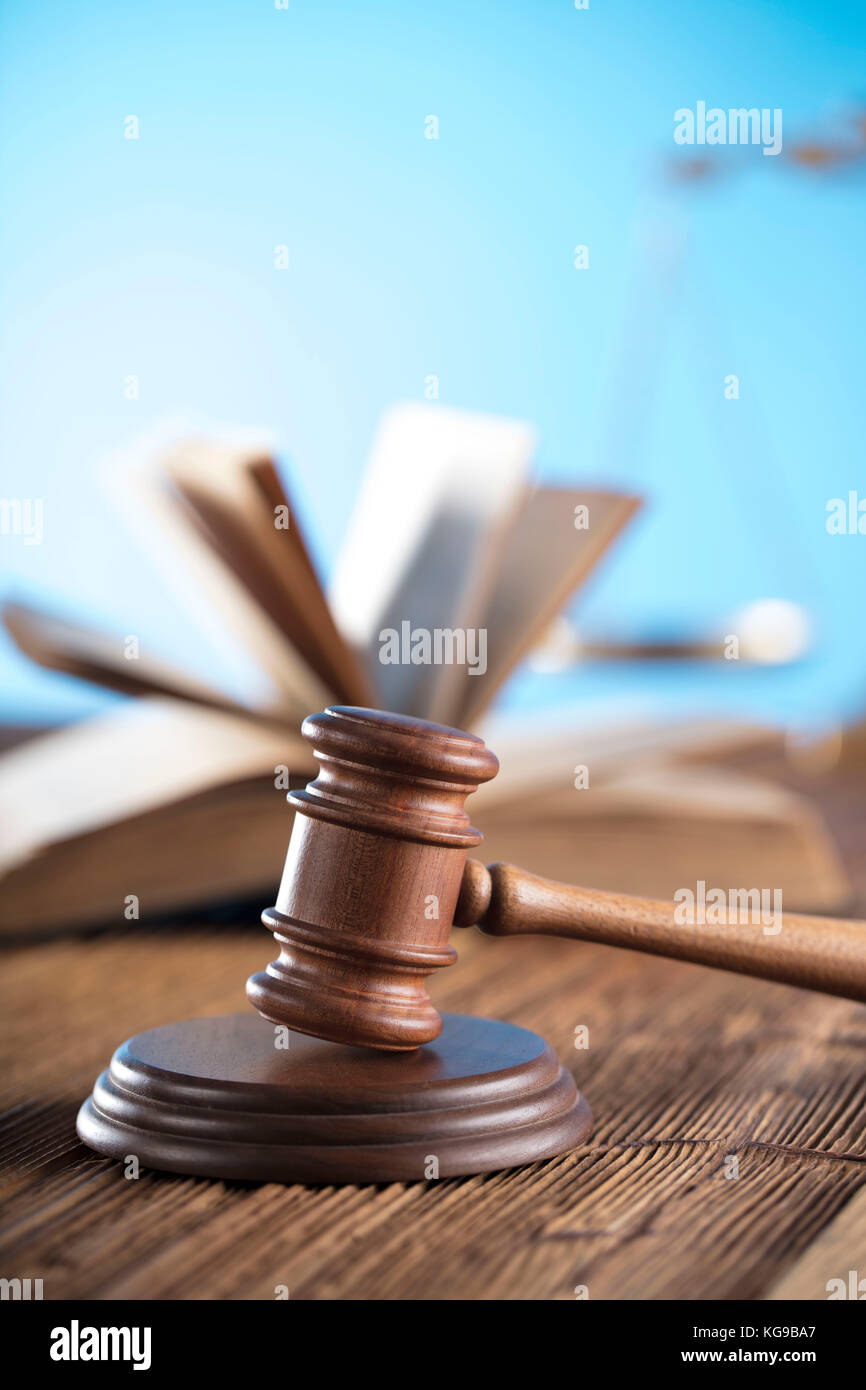 Judge concept. Mallet of the judge, justice scale and books on wooden ...